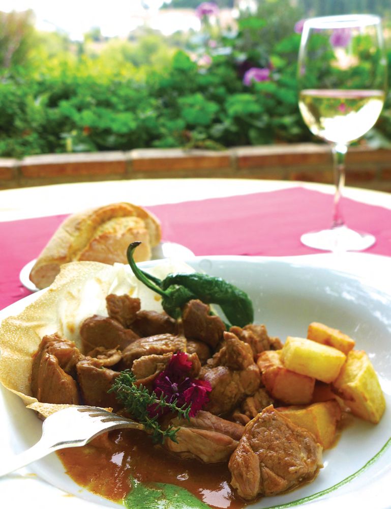 Kid goat in garlic sauce from Andaluz: A Food Journey Through Southern ...