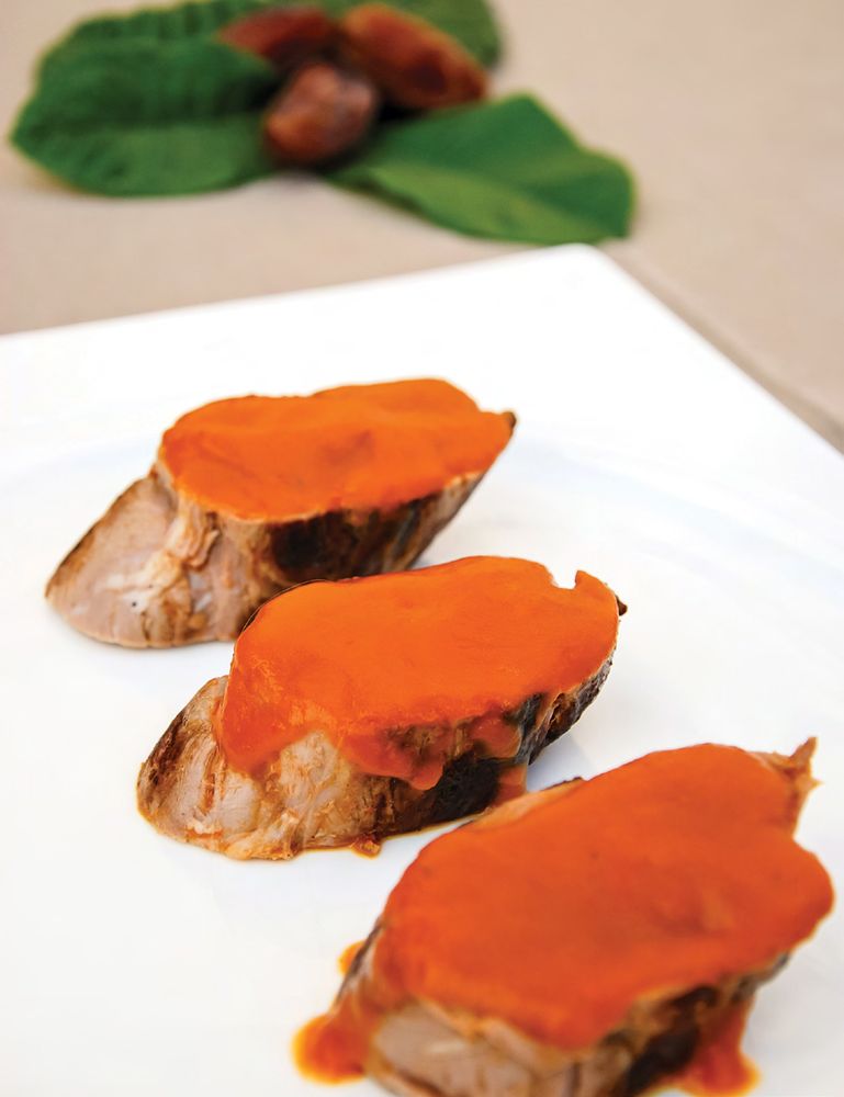 Iberian pork tenderloin stuffed with dates in quince and chocolate ...