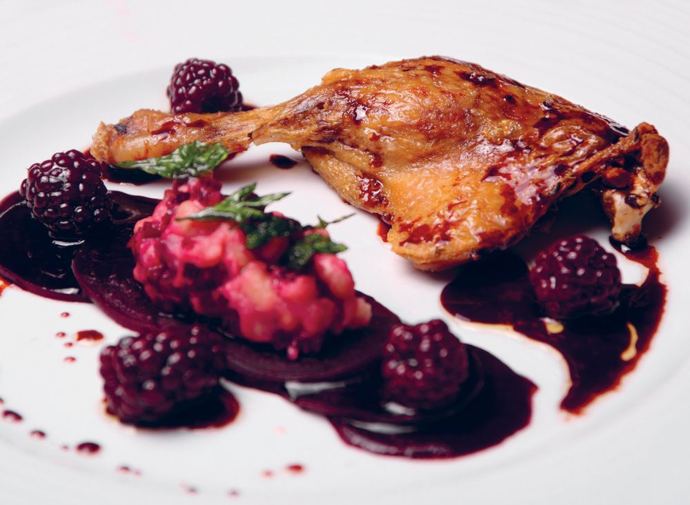 Confit wild duck legs, poached beetroot, haricot beans, pomegranate ...