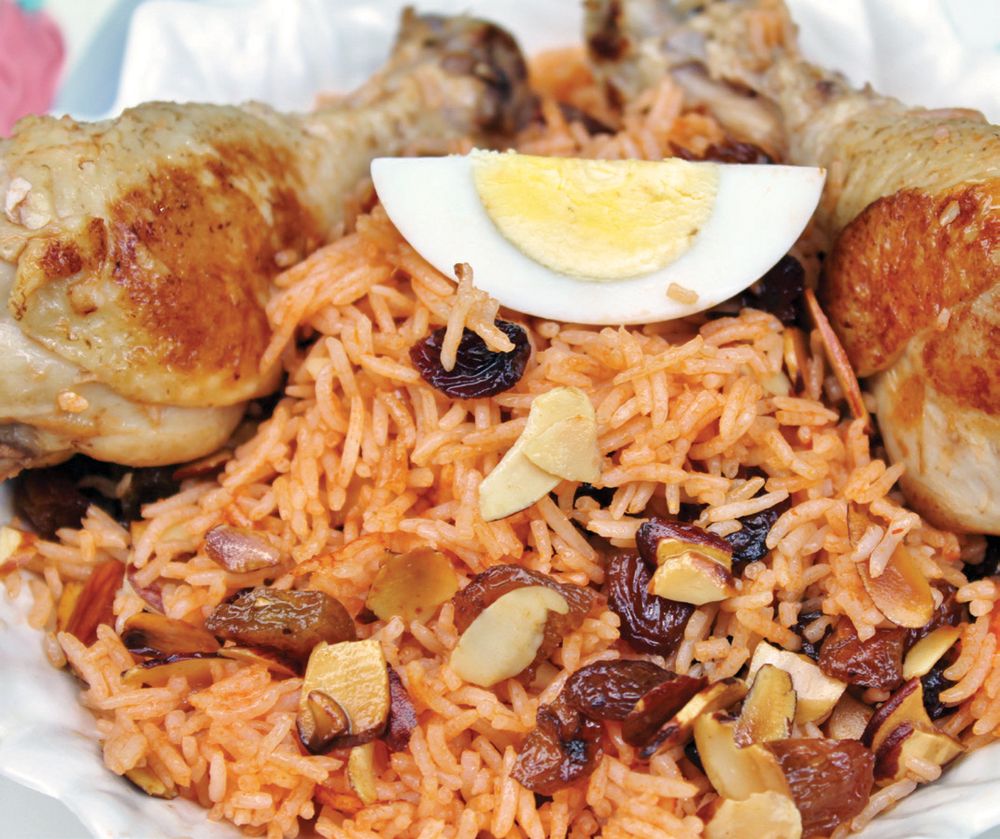 Chicken with Red Rice from Delights from the Garden of Eden by Nawal ...