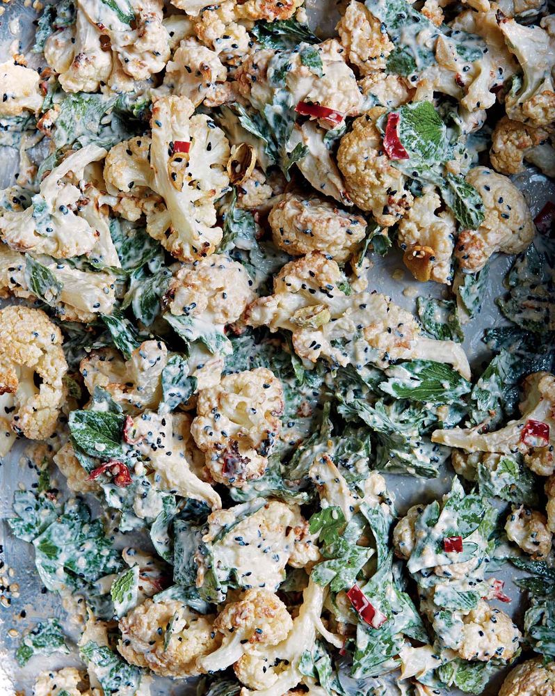 Spiced roast cauliflower and garlic with tahini yogurt dressing from ...