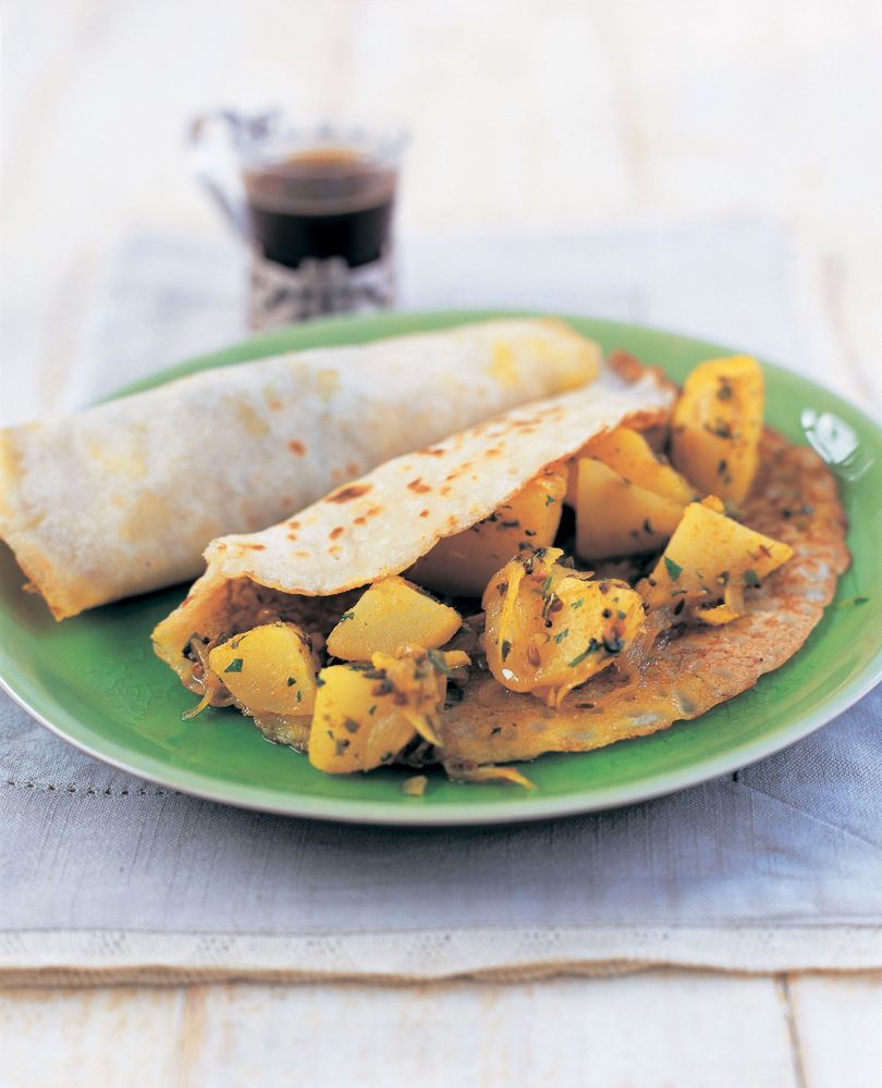 Rice pancakes filled with spiced potatoes from The Complete Indian ...