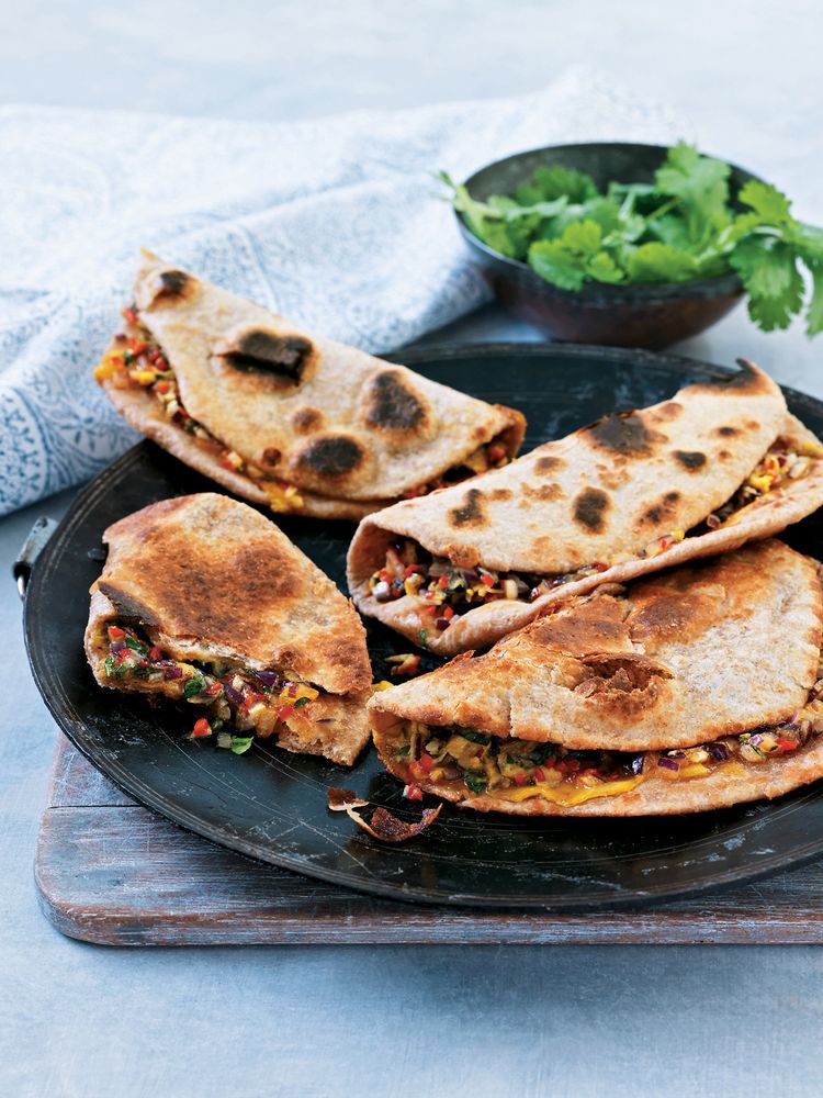 Spicy egg-filled flaky bread from The Complete Indian Regional Cookbook ...